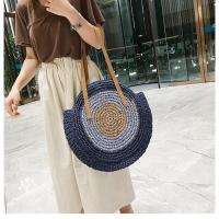 China 2022 Handwoven Round Beach Shoulder Bag Straw Bag with Leather Handle and Custom Logo for sale
