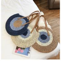 China 2022 Handwoven Round Beach Shoulder Bag Straw Bag with Leather Handle and Custom Logo for sale