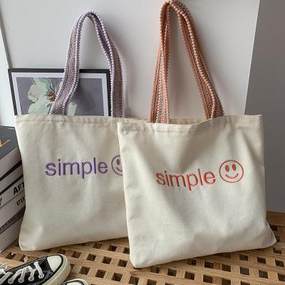 China Custom Eco Totebag Printing Reusable Cotton Canvas Shopping Bag with Letter Pattern for sale