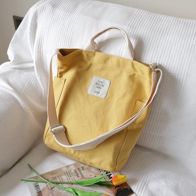 China Customized Color Medium Size Girl Canvas Chest Crossbody Tote Shoulder Messenger Bag for sale