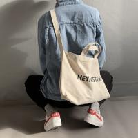 China Custom Large Canvas Tote Bag Accepable OEM/ODM for Letter Print Cross Body Messenger Bag for sale