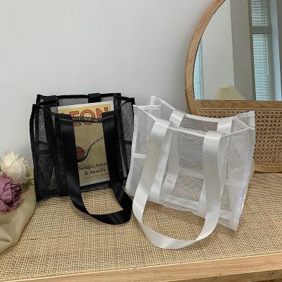 China 2022 Customized Fashion Print Large Mesh Tote Bag Women's Beach Bag with Hollow Out for sale