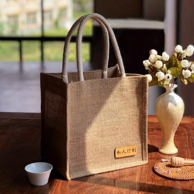 China Eco-Friendly Jute Shopping Bags with Customized Printed Logo and Leather Handles for sale