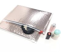 China New Trend Lip Gloss Tubes Bubble Zipper Bag Hologram Zippered For Jewelry for sale
