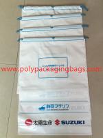China Extra Large Capacity White PE String Bag / Drawstring Pocket Simple And Generously Printed Clothes Bag for sale