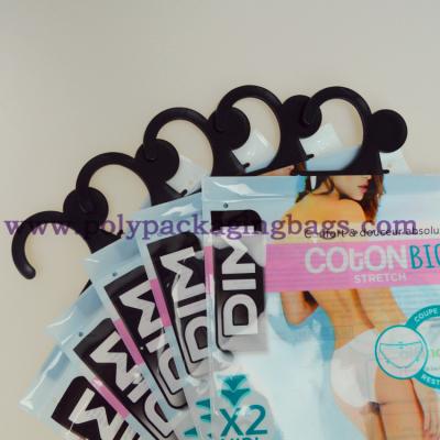 China Self Adhesive Seal Garment Ziplock Poly Bags With Hangers for sale