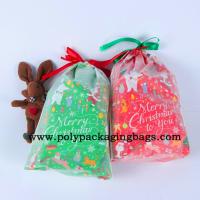China Exquisite 0.075mm Plastic Drawstring Christmas Gift Bags for sale
