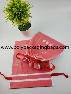 China Recyclable drawstring plastic  Cotton Ropes  bags/Women and children all like the New Year red gift bag for sale