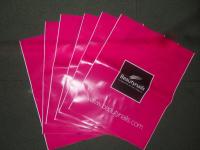 China Fashionable Cosmetic Die Cut Handle Plastic Bags With Side Gusset for sale