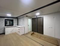 China 38.2m² Premium Expandable Container House (Wood Grain Finish) for sale