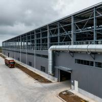 China Custom PEB Steel Structure Prefab Warehouse with Q355B S235JR Clear Span Design for High Seismic Zone for sale