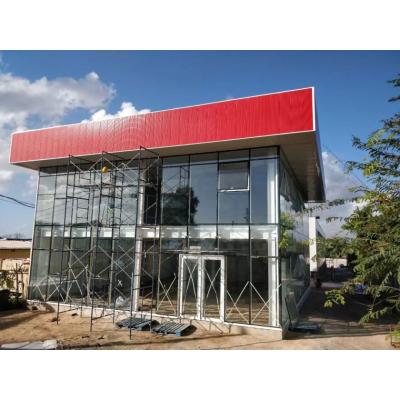 China Light Steel Frame Commercial Steel Building Durable and Affordable Steel Frame Building for Cafe Shop Retail for sale