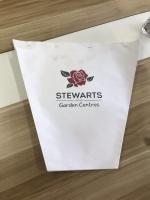 China Horticultural Packaging Material Clear Printed Kraft Paper Flower Sleeves for sale