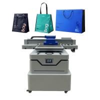 China Multifunction 6090 UV FlatBed Machine Print Phone Case Glass Bottle Pen PVC Acrylic Ceramic Wood Metal for sale