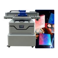 China Factory Price 6090 Price with 3 I3200/XP600 Heads CCD Camera,and Rotary Attachment  UV Flatbed Printing for Multi-Material for sale