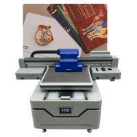 China Factory Price 6090 Price with 3 I3200/XP600 Heads CCD Camera,and Rotary Attachment  UV Flatbed Printing for Multi-Material for sale
