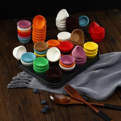 China Food Grade Greaseproof Muffin Liners 220C Non Stick Baking Paper Cups Cupcake Wrappers for Bakery for sale