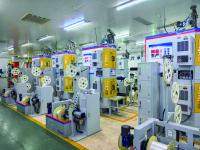 China Vertical Wrapping Machine With Servo Controlled Tension For Silver Copper PTFE Tape for sale