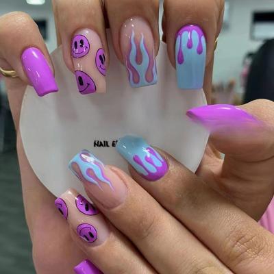 China 2023 Style OEM Luxury Long Smiling Face False Nails Artificial Fingernails Full Cover Carton Design for sale