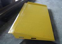 China Yellow Mobile Hydraulic Loading Ramp On Ground Loading And Unloading for sale