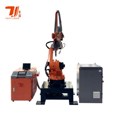 China New Arrival 1500W Fiber Robotic Laser Welding Machine with CCD for Accurate Metal Joining for sale