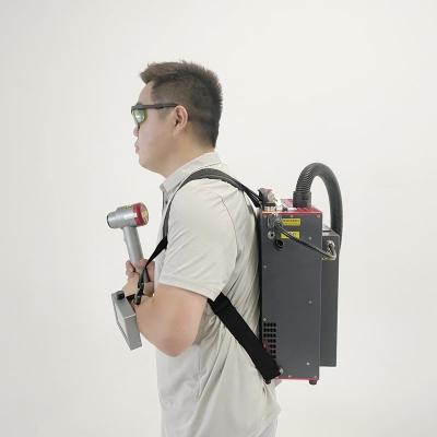 China 50W Portable Backpack Laser Cleaning Machine Pulse Fiber Laser Rust Remover for Precision Mold Cleaning for sale