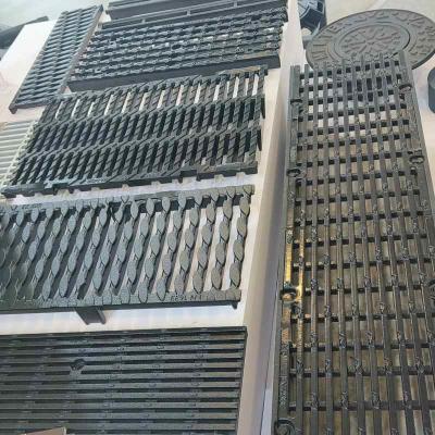 China EN 124 Standard Cast Iron Gully Grating Heavy Duty Drain Grate For Road Yard With Frame for sale