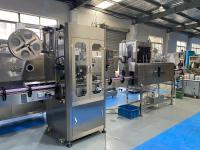 China Automatic Stretch Sleeve Labeling Machine with Competitive Price for sale