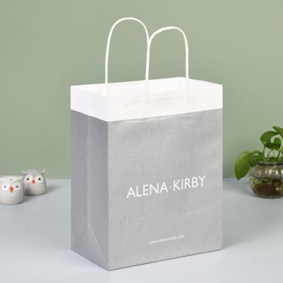 China 120gsm Recycled Durable White Paper Bags With Twisted Handles for sale