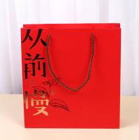 China Gold Foil Red Matt Laminated Kraft Paper Shopping Bags With Handles for sale