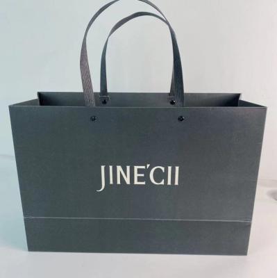 China Matt Laminated Kraft Paper Shopping Bags With Handle Offset Printings for sale