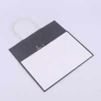 China CMYK Printing Wide Base Paper Carrier Bags for sale