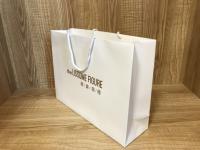 China 250gsm Recycled ODM White Paper Shopping Bags With Handles for sale