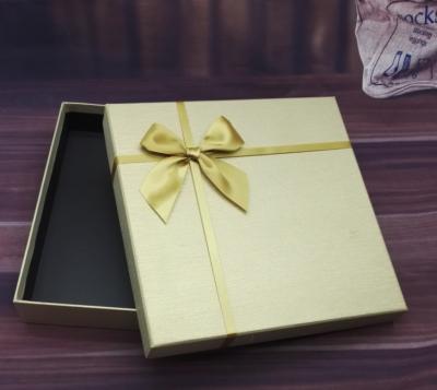 China Matt Lamination Butterfly Ribbon Closure Rigid Cardboard Gift Boxes for sale