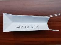 China CMYK Printed Kraft Paper Takeaway Shopping Bags 60gsm Food Grade for sale