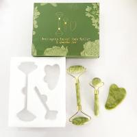 China Anti Aging Natural Stone Pink White Mini Facial Skin Custom Magnetic Box Packaging Green Jade Roller for sale