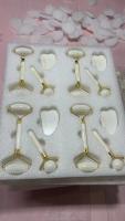 China Face Healthcare Massage Roller Function Green Natural Jade Roller and Gua Sha Stone Set for sale