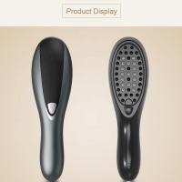 China Beauty Device RF Light Therapy Comb with Import Hair Growth Liquid and Hair Care Oil for sale