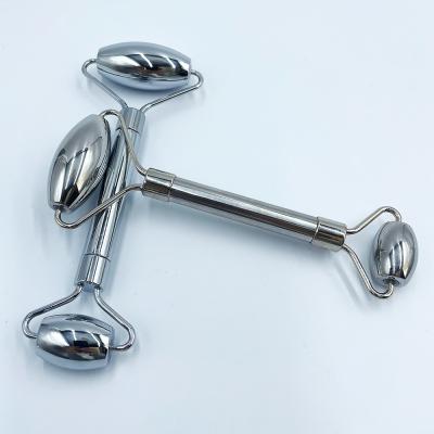 China Facial Beauty Custom Logo Stainless Steel Gua Sha Comb for Neck and Face Massage Roller for sale