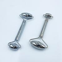 China Green Face Healthcare Massage Roller Gua Sha Tool in 304 Stainless Steel with Custom Logo for sale
