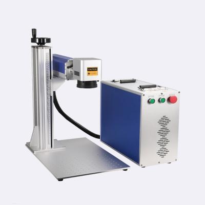 China Small Size Desktop Laser Marking Machine with 8000-10000mm/s Marking Speed and 1064nm Wavelength for sale