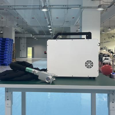 China Portable Laser Cleaning Machine with 50W/100W/200W/300W Power and Air Cooling for Efficient Rust Removal for sale