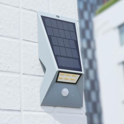 China Landscape Color Changing Pir Solar Powered LED Wall Light With Remote for sale
