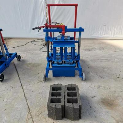 China Automatic 2-Hole Concrete Brick Making Machine 220V 180kg for Construction Waste Processing for sale