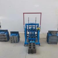 China Automatic 2-Hole Concrete Brick Making Machine 220V 180kg for Construction Waste Processing for sale