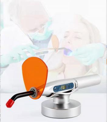 China Dental LED Curing Light with 2600mA Battery and 1200-2000mw/cm² Intensity for Composite Resin for sale