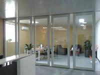 China Aluminum Sliding Partition Walls with 33dB Sound Insulation and 4.0kPa Wind Resistance - No Floor Track Required for sale