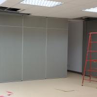 China Soundproof Sliding Folding Partitions for Auditorium 65mm 85mm 100mm Aluminum Frame MDF Finish for sale