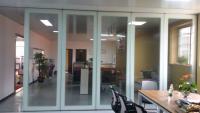 China Folding Glass Partition Wall Interior Glass Door 65mm Thickness 4500mm Height for Banquet Hall for sale