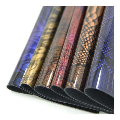 China Waterproof Custom Leatherette Fabric Printing Patent Printed Leather Fabric for sale